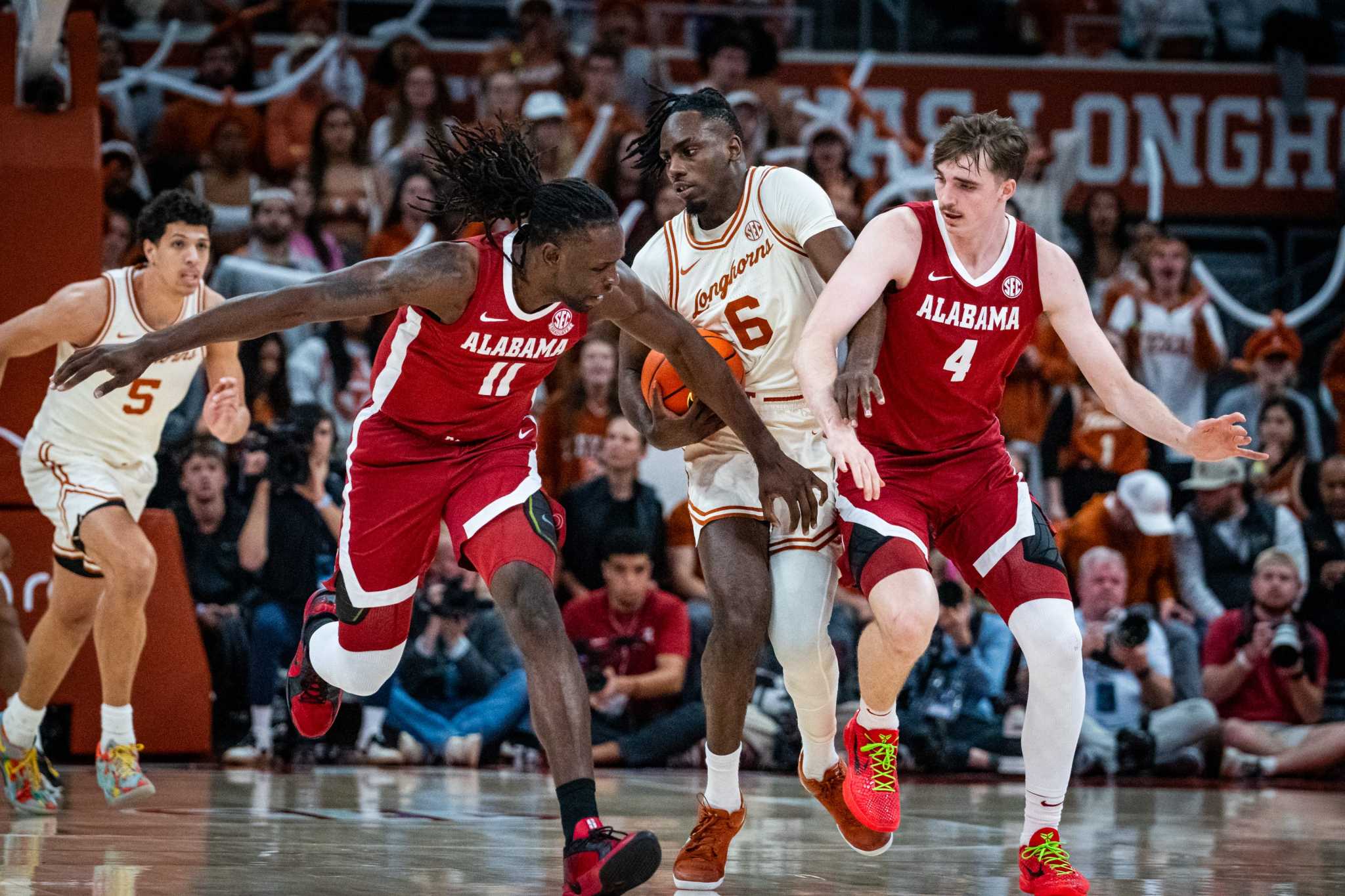 Texas men's basketball roster depth tested after Arthur Kaluma injury ...