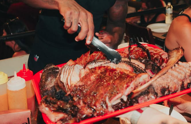NFL's fastest man stops at iconic Texas barbecue joint