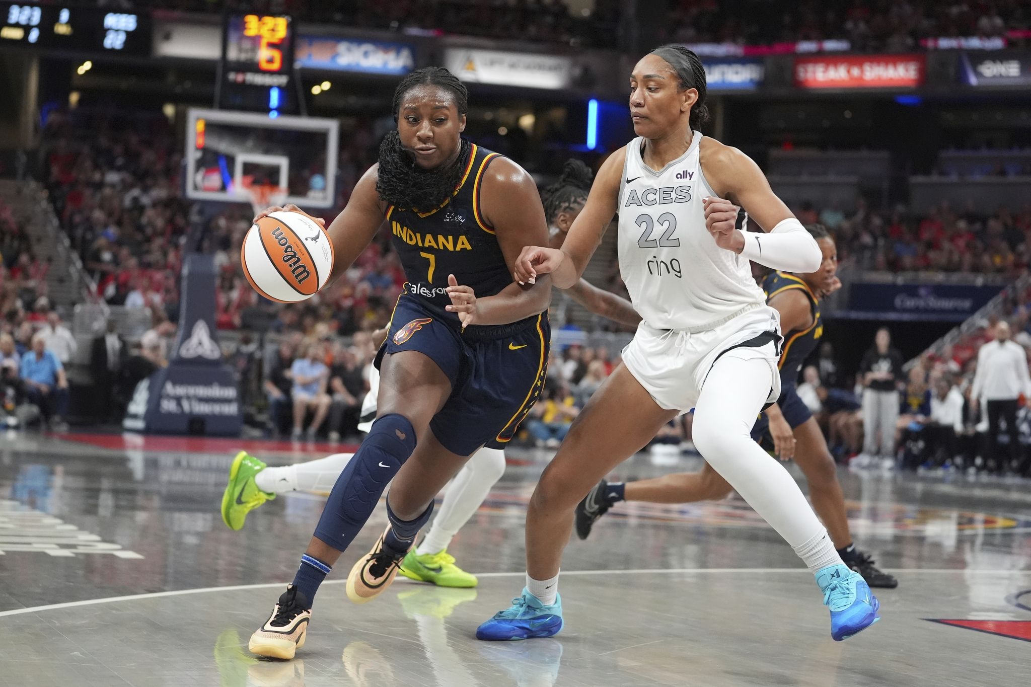 Aces star A'ja Wilson injures her right wrist on a drive to the basket ...