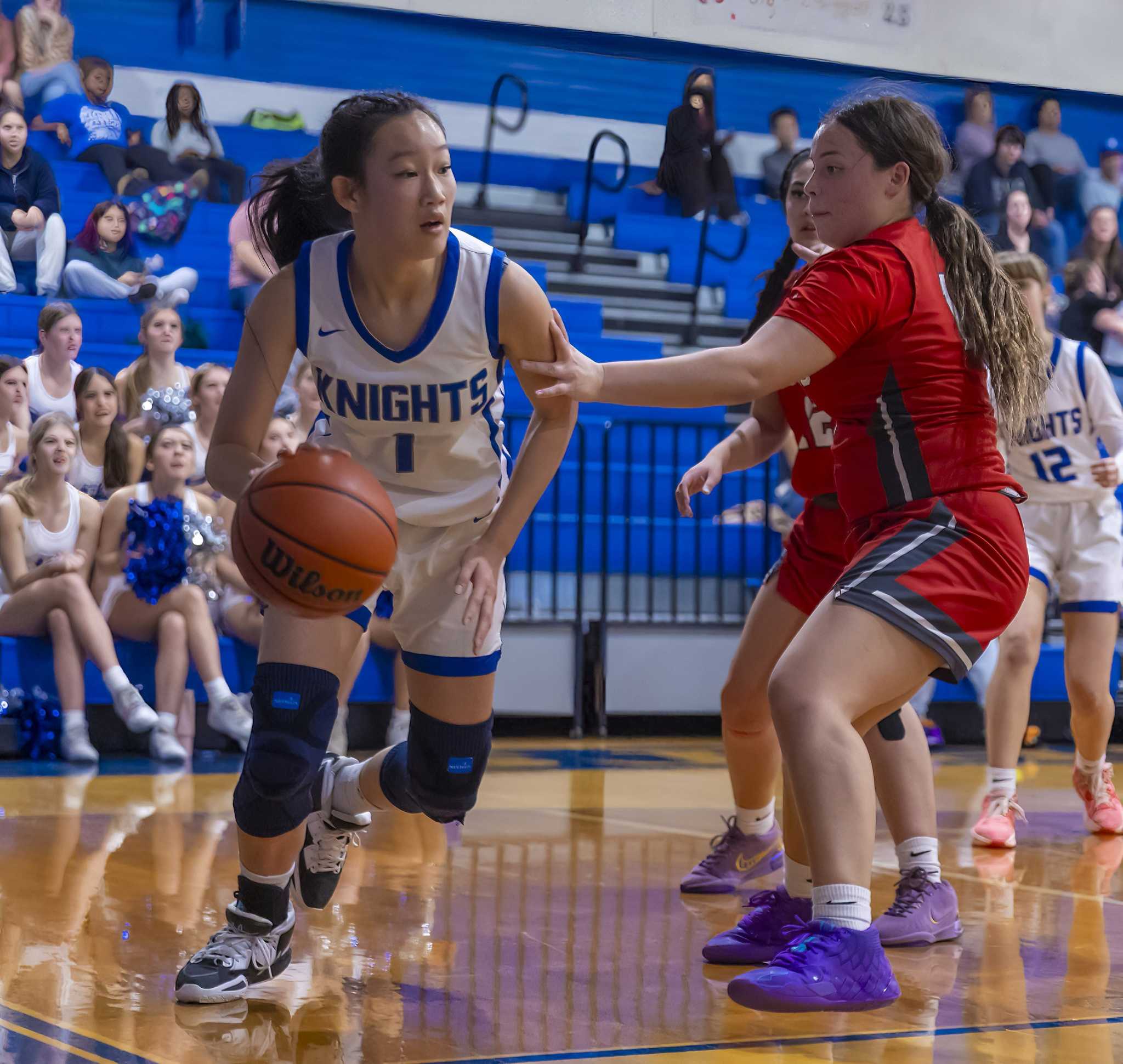 Prep girls basketball: Austin area district races at the halfway mark