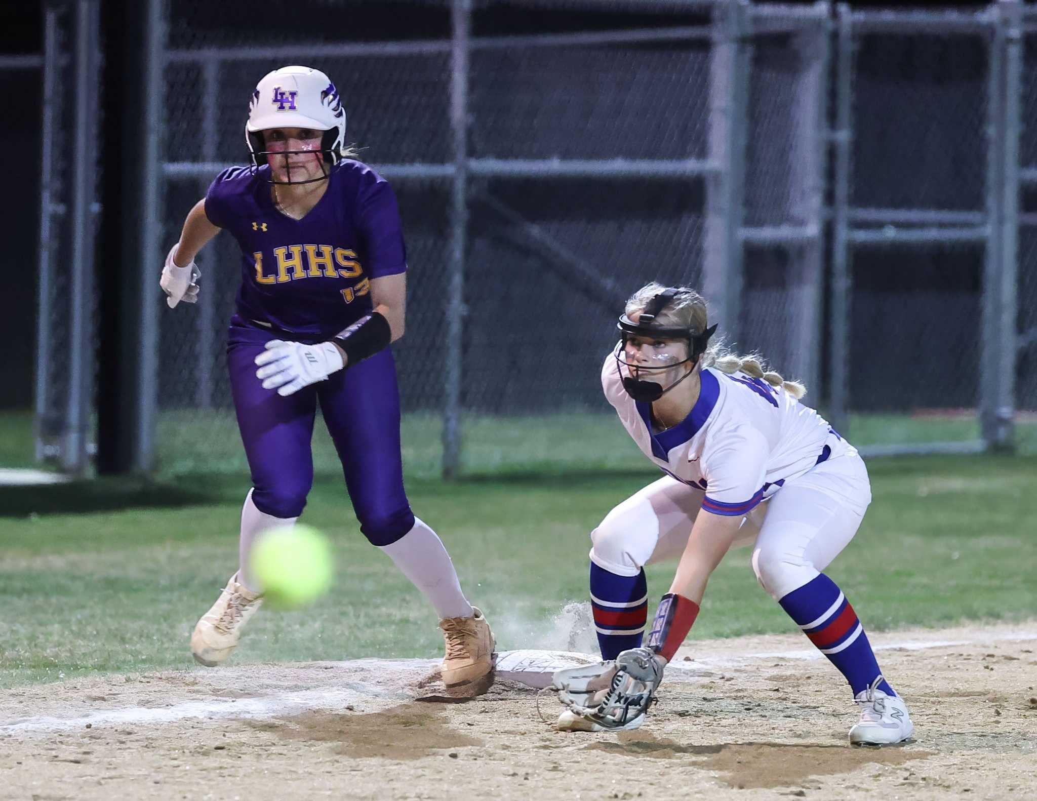 High school softball heats up in season's second half of district play