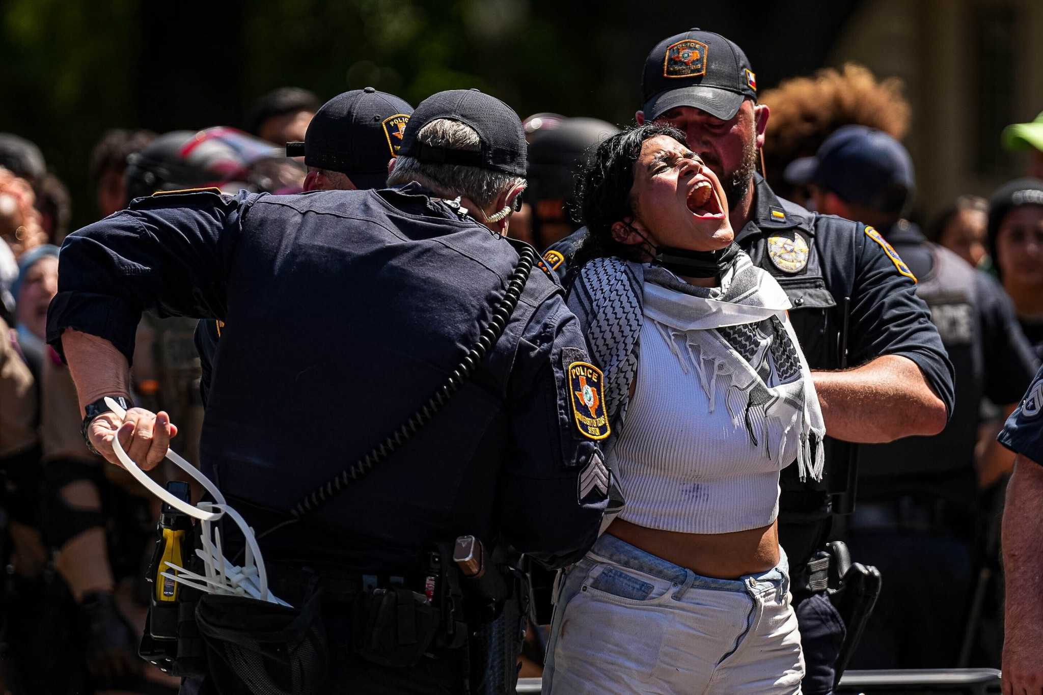We're veterans of peaceful protests. Here's how UT can ease tensions.