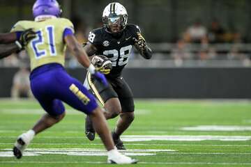Why Vanderbilt's top RB, an AISD rushing legend, has had 'Horns down ...