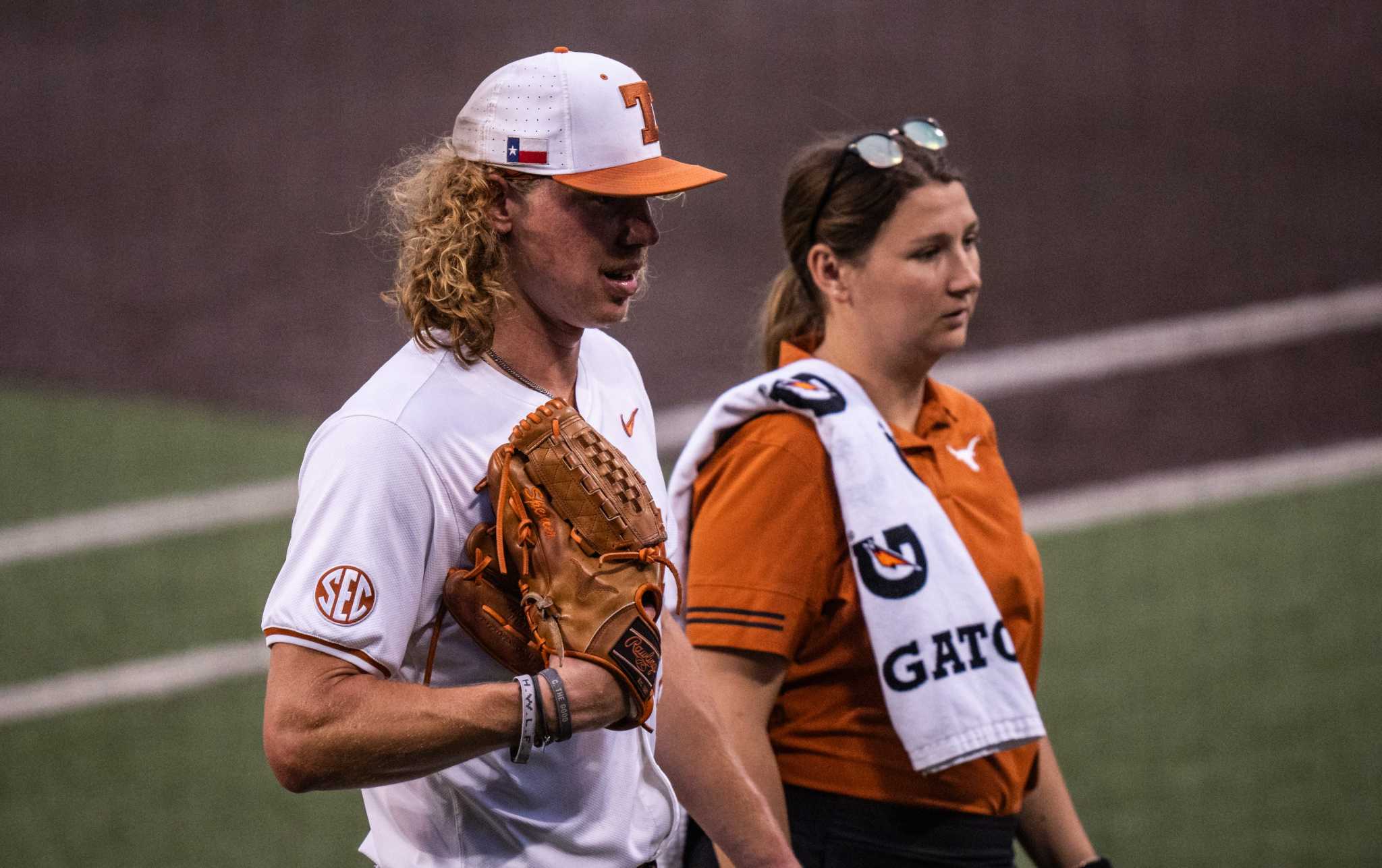 Jared Spencer, Texas' Friday starter, sidelined by shoulder injury