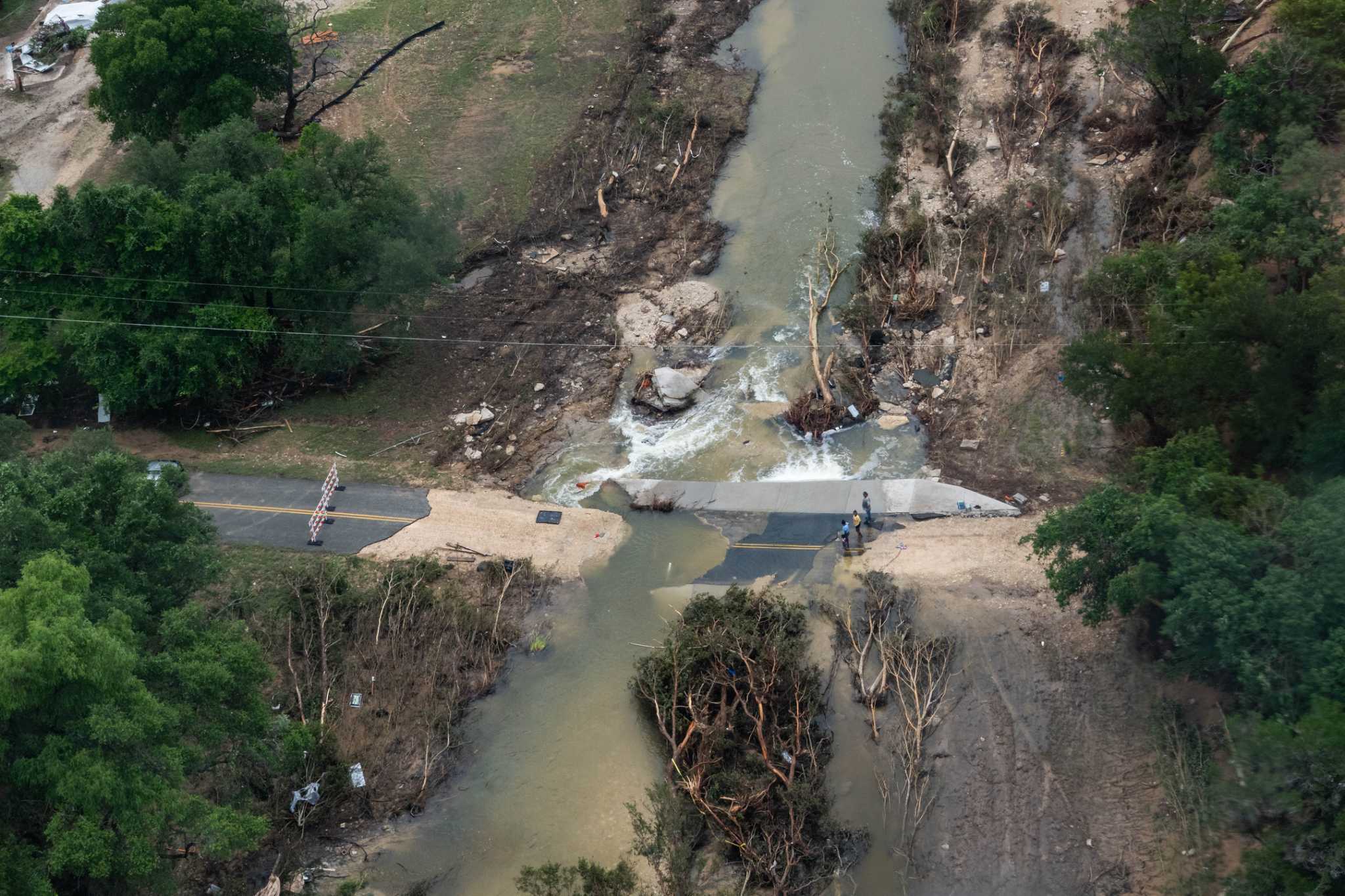 Travis officials admit communication flaws but stand by flood response