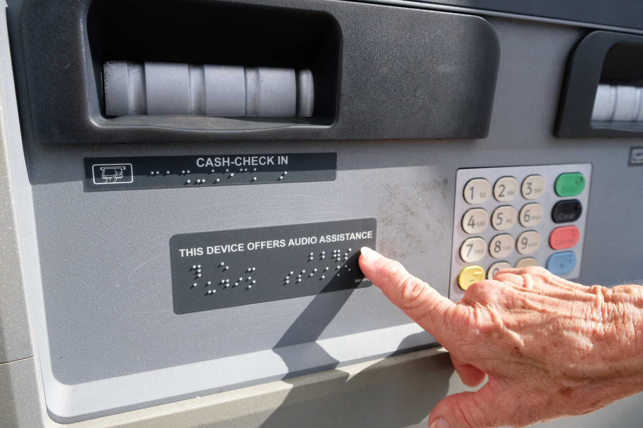 Whose big idea was it to put Braille instructions on drive-through ATMs?