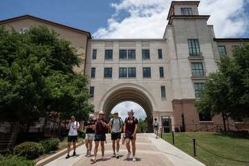 What are some of the things a Houston library card offers?