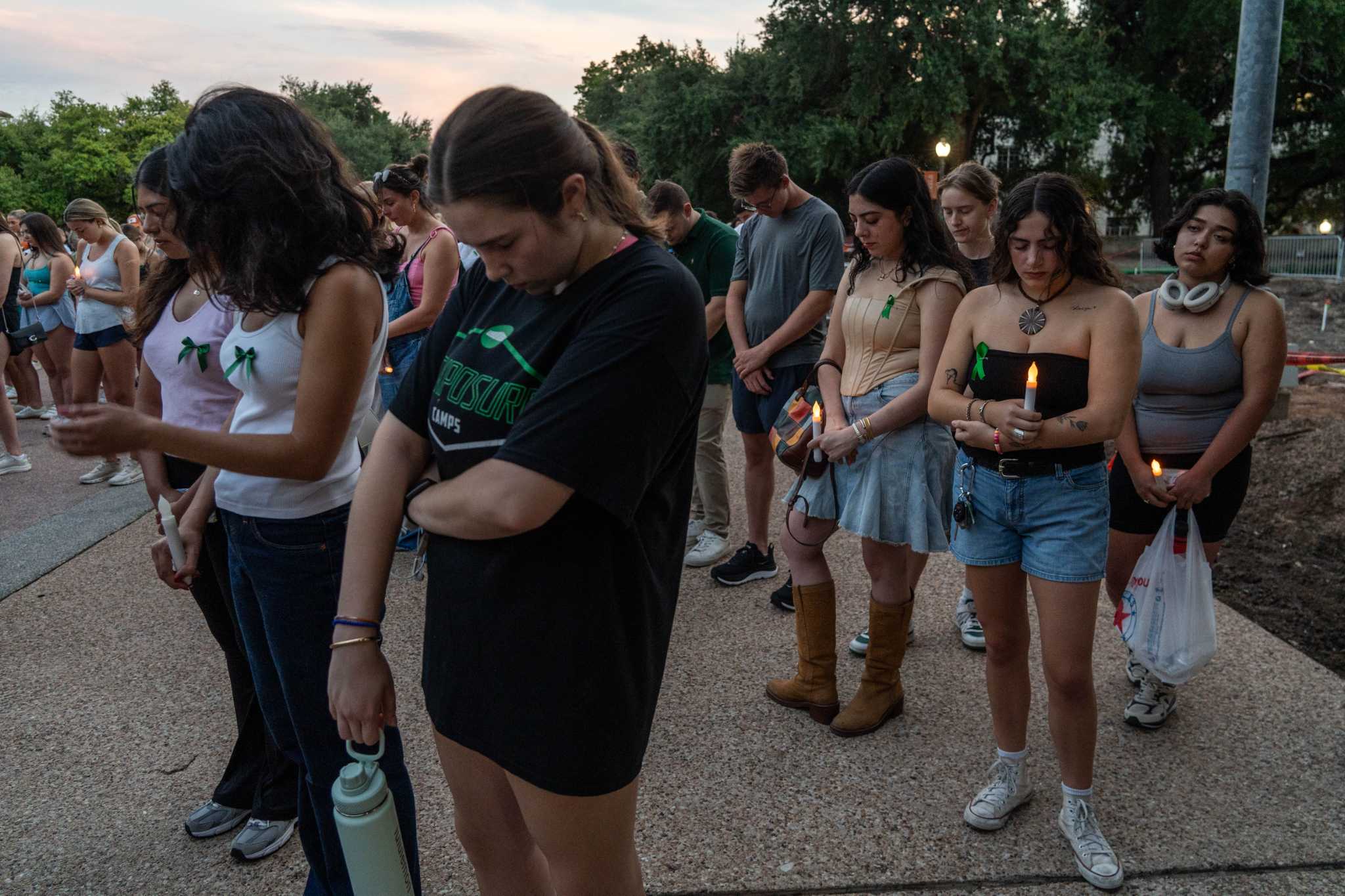 Texas Panhellenic Council holds vigil to honor Texas flood victims