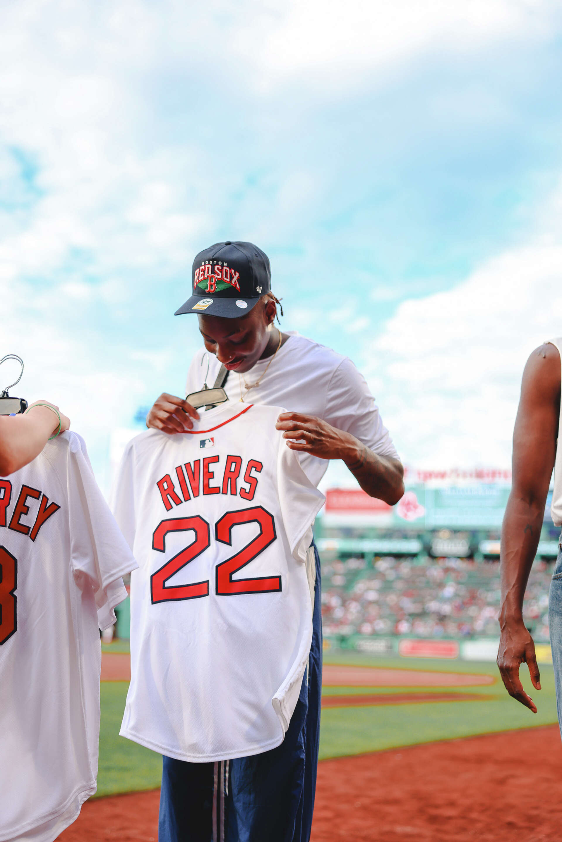 CT Sun players throw out first pitch at Boston's Fenway Park