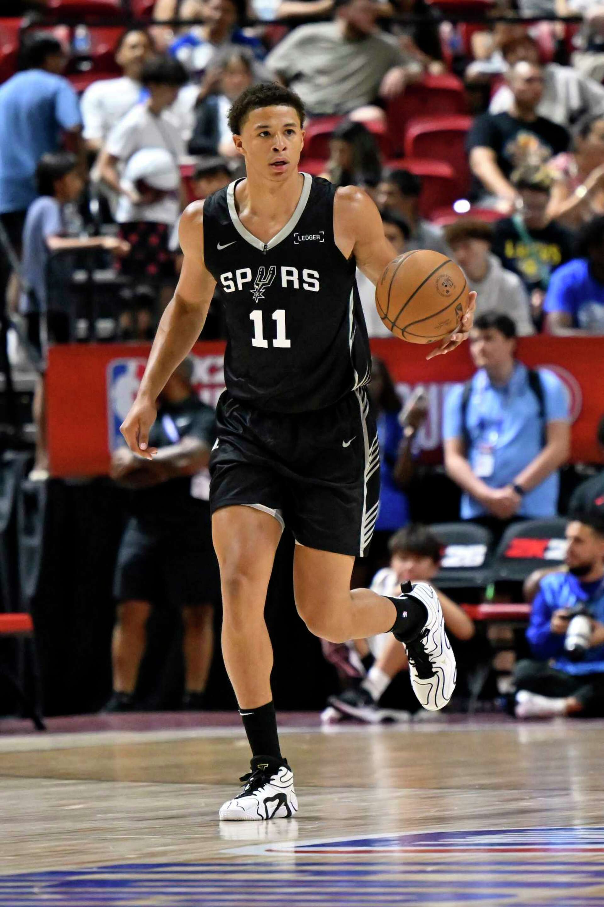 Spurs' Carter Bryant at ease singing to fans