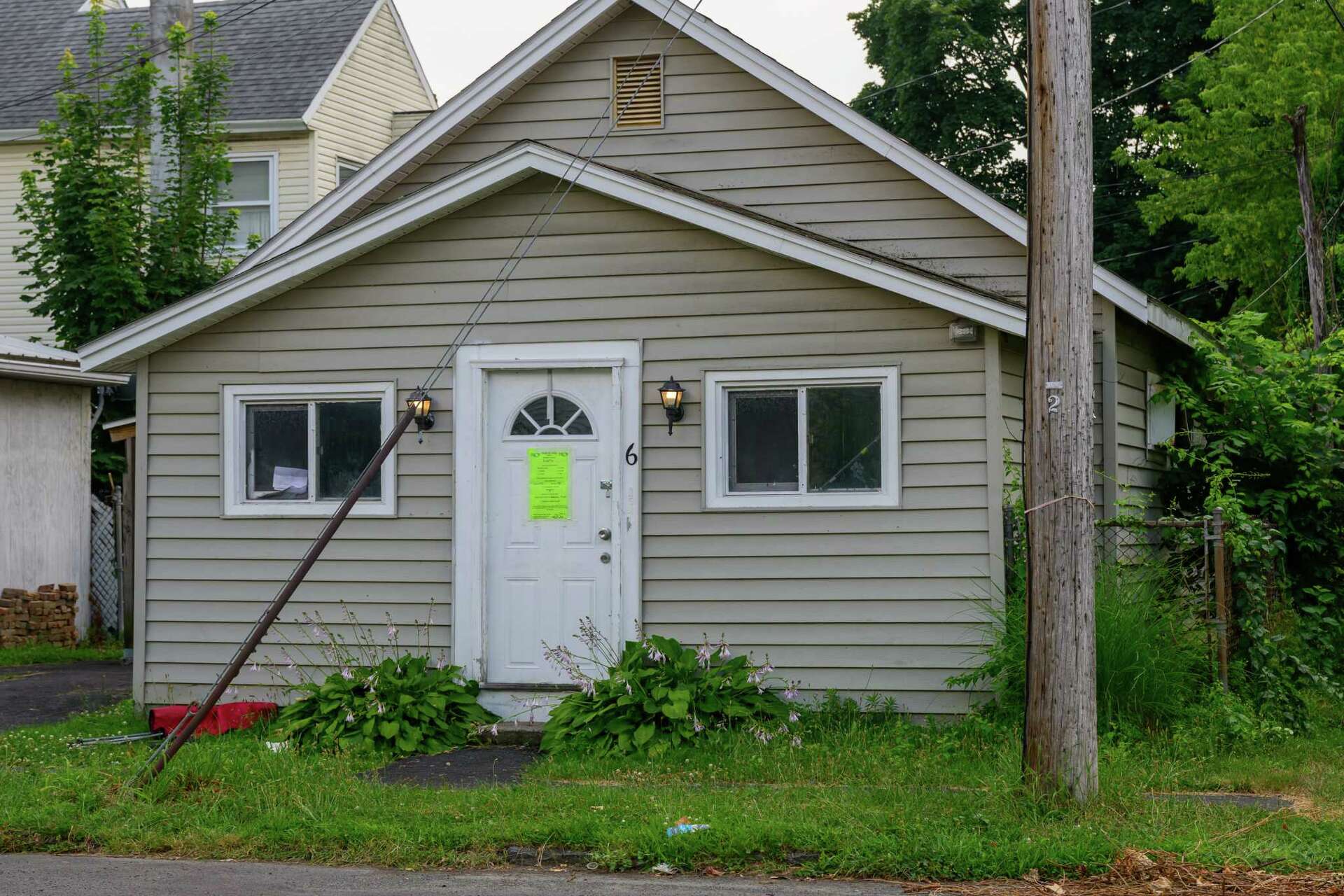 Police find at least one dog dead, others malnourished in Troy home