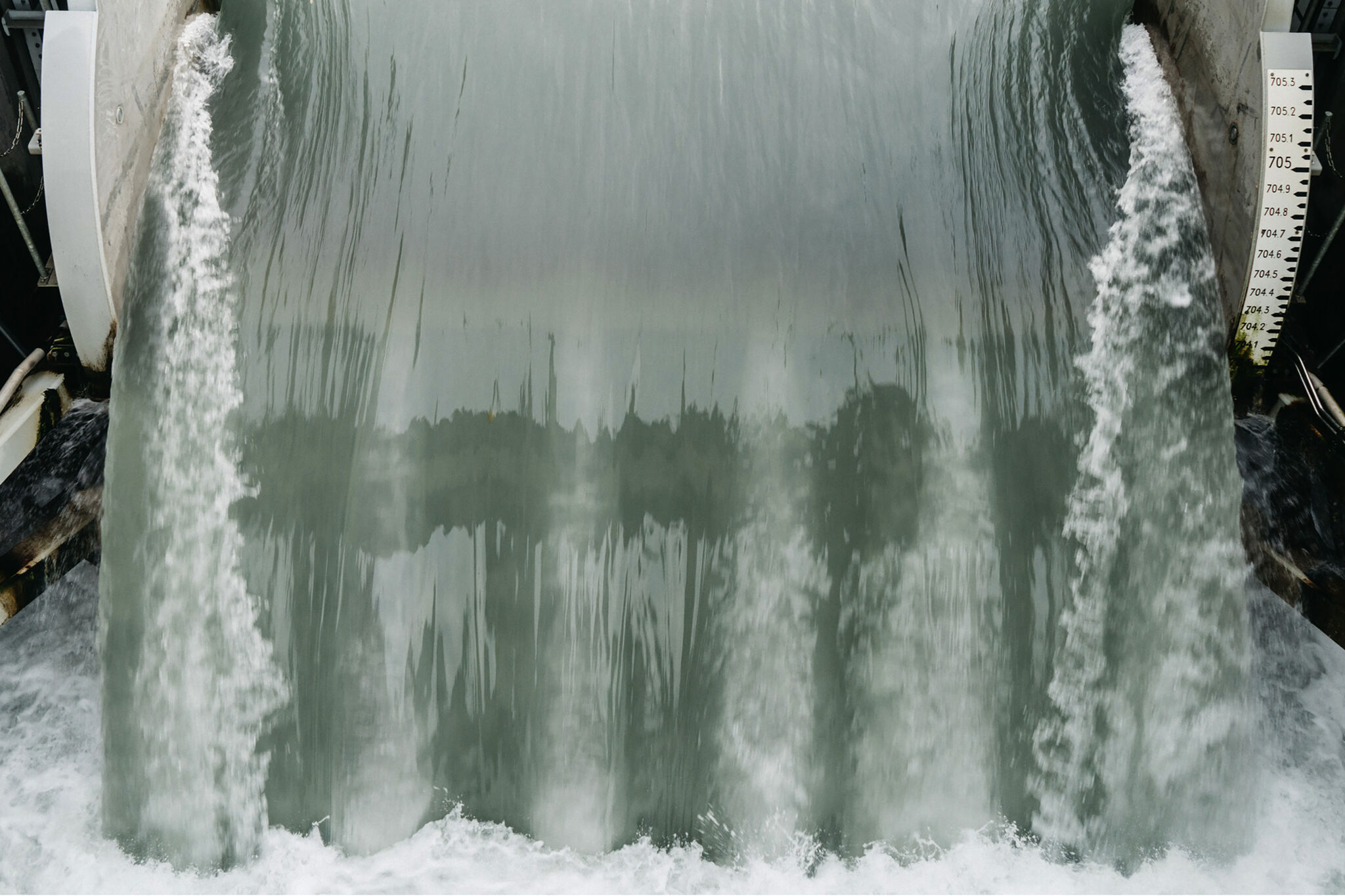 Texas lake nearing capacity forces dam gates to open