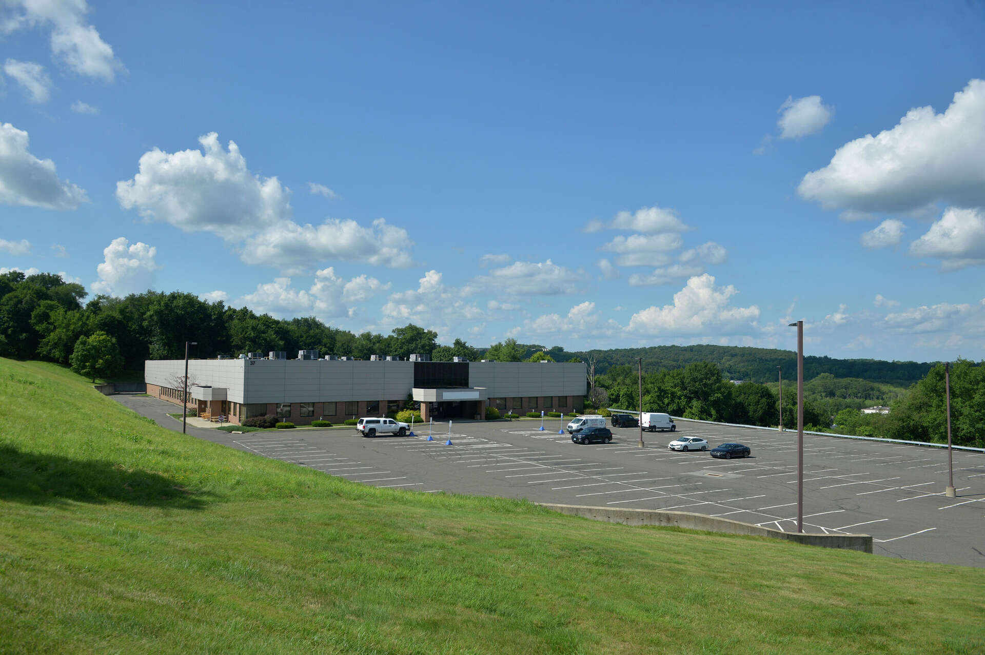High-tech executive sees 300% growth in new Danbury facility