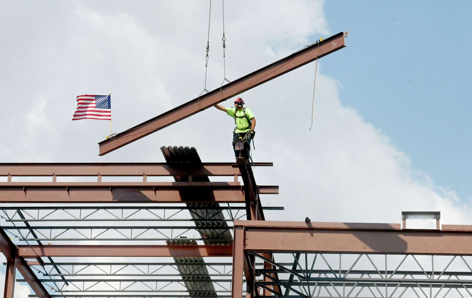 Manchester library reaches structural completion with beam ceremony