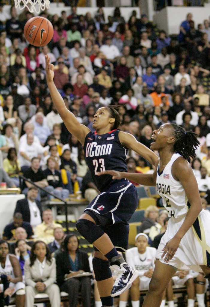 Moore scores 30, leads UConn to 81st straight victory