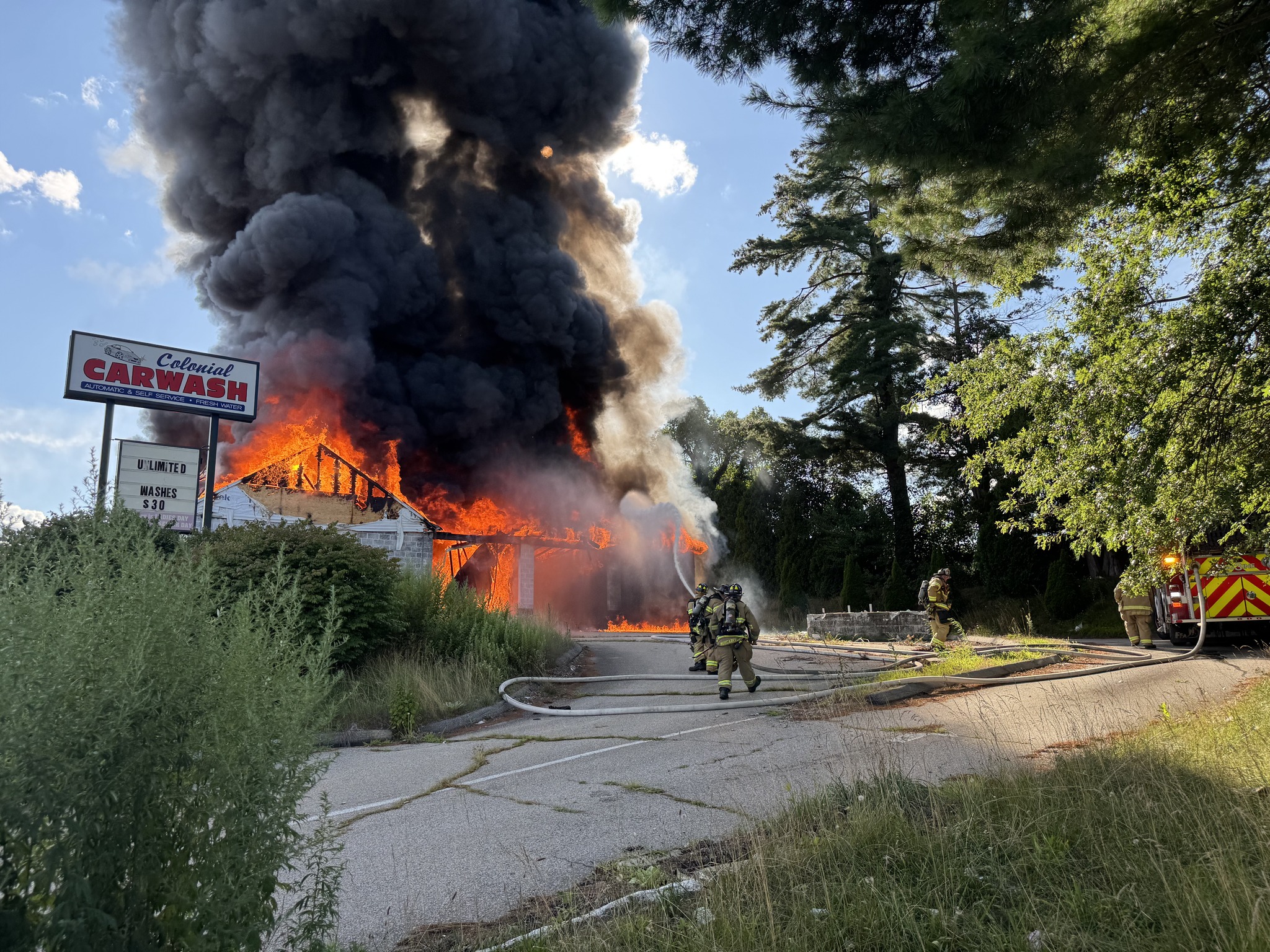 Norwich firefighters battle fire at former car wash, officials say