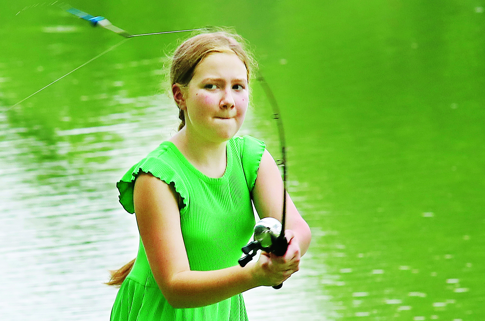 Alton family enjoys fishing at Glazebrook Park in Godfrey