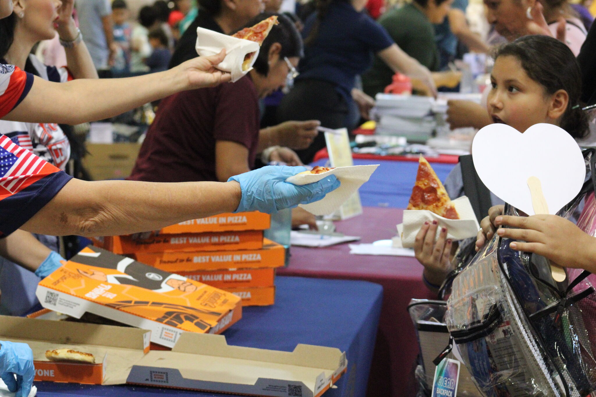 PHOTOS: Officials give school supplies to students at annual event