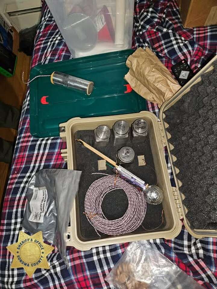 Former officer suspected in arson now faces explosives, drug charges