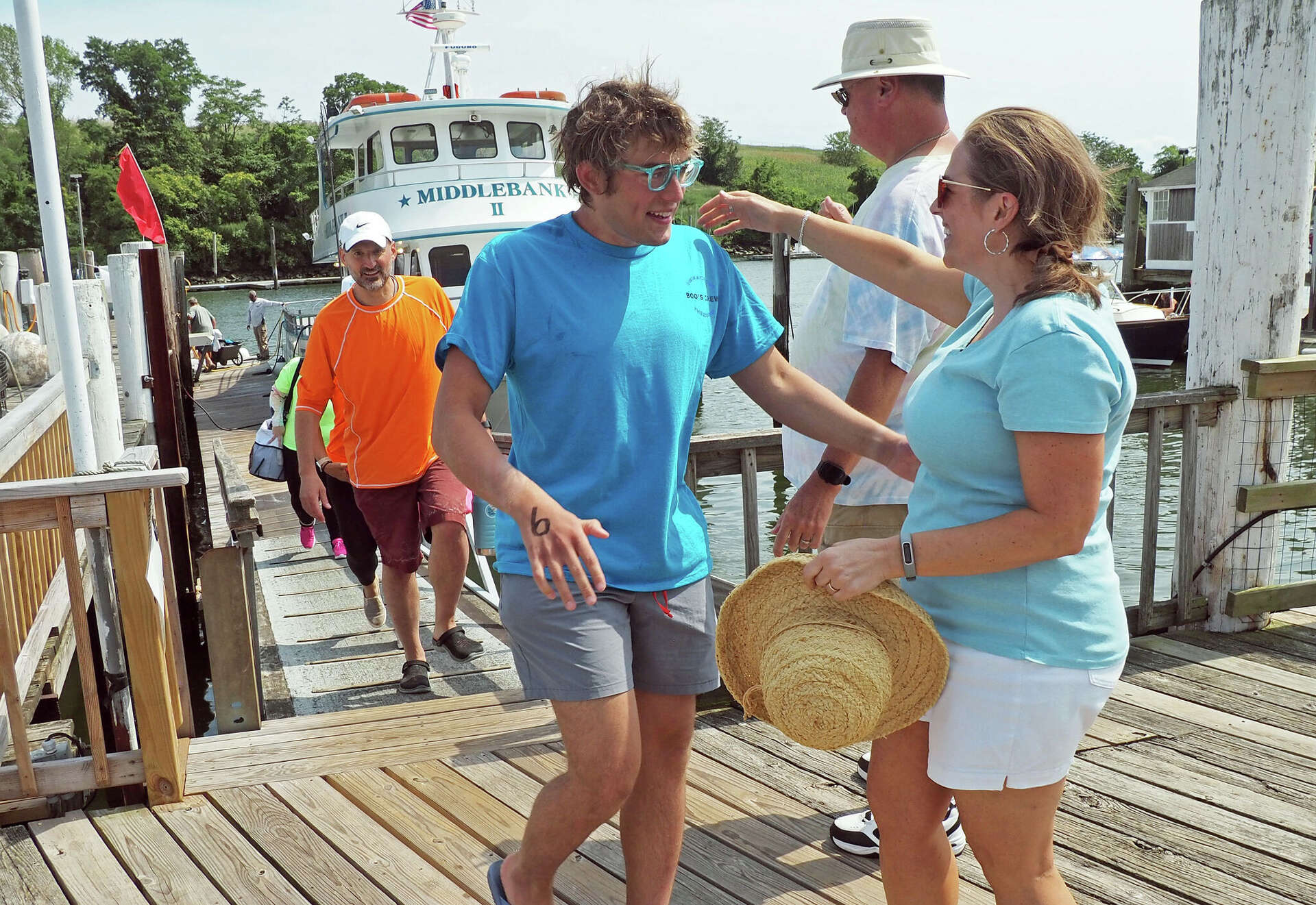 Photos: CT residents swim across the Sound for hospital fundraiser