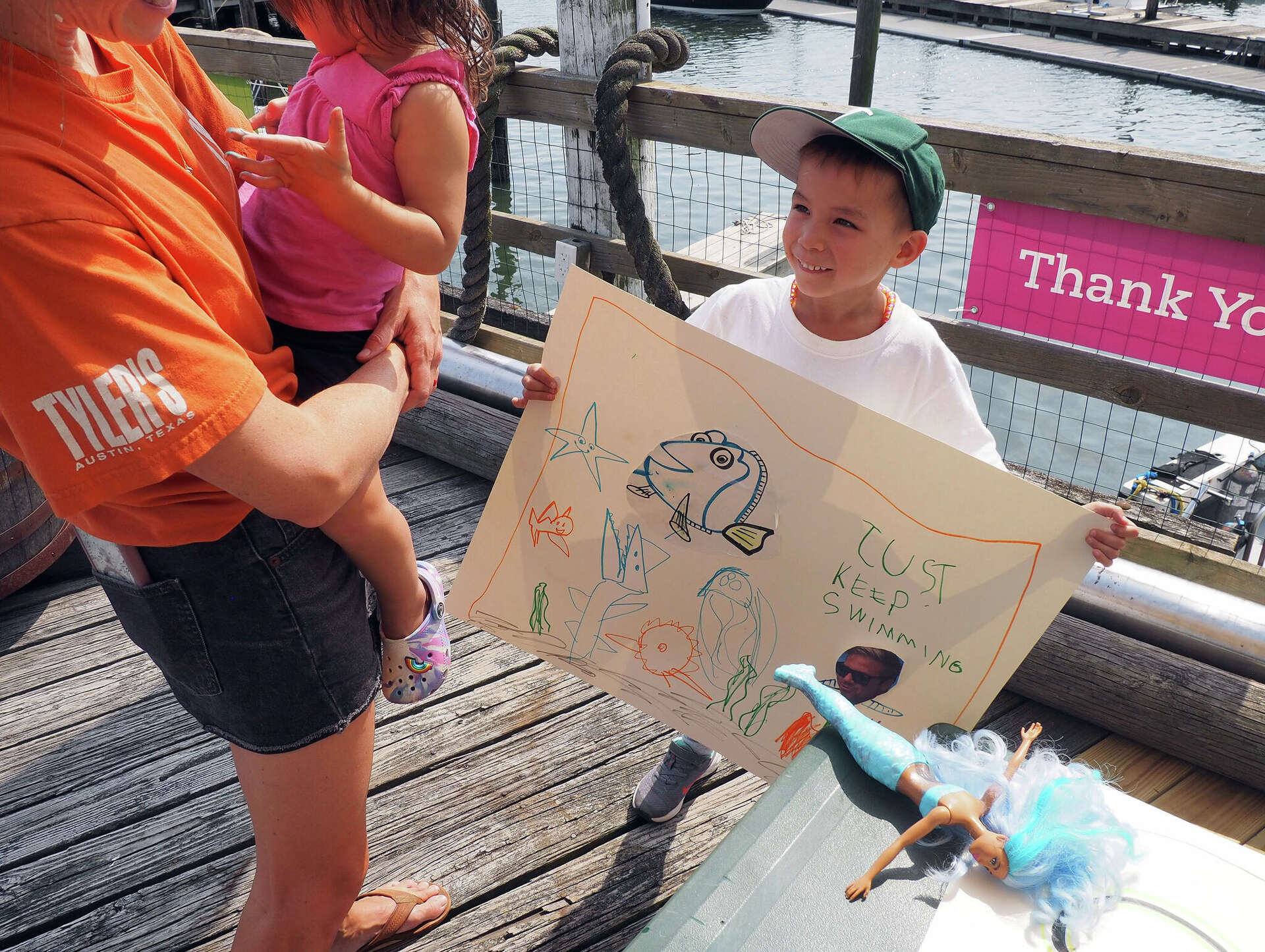 Photos: CT residents swim across the Sound for hospital fundraiser