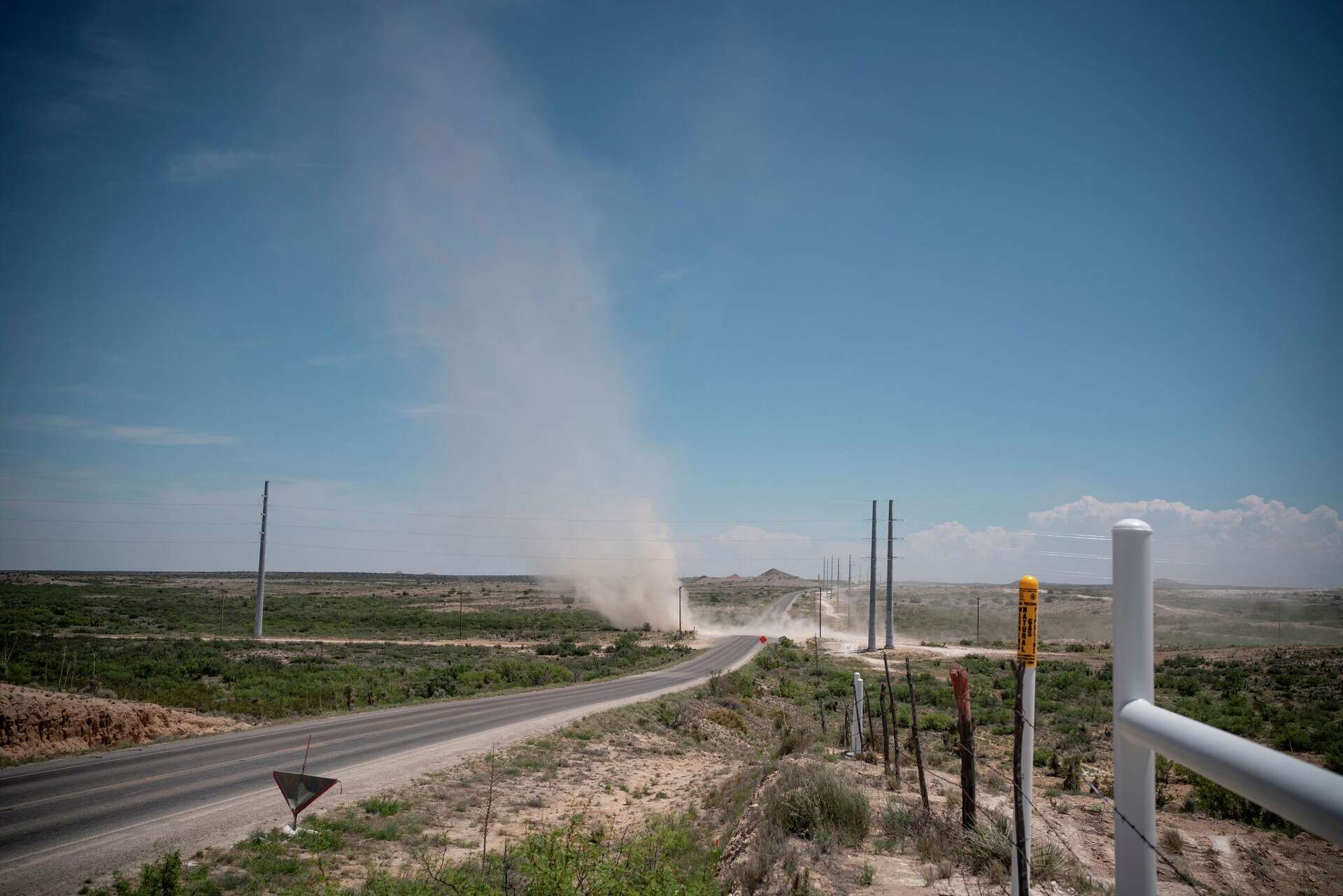 What are dust devils and why do they form across Texas?