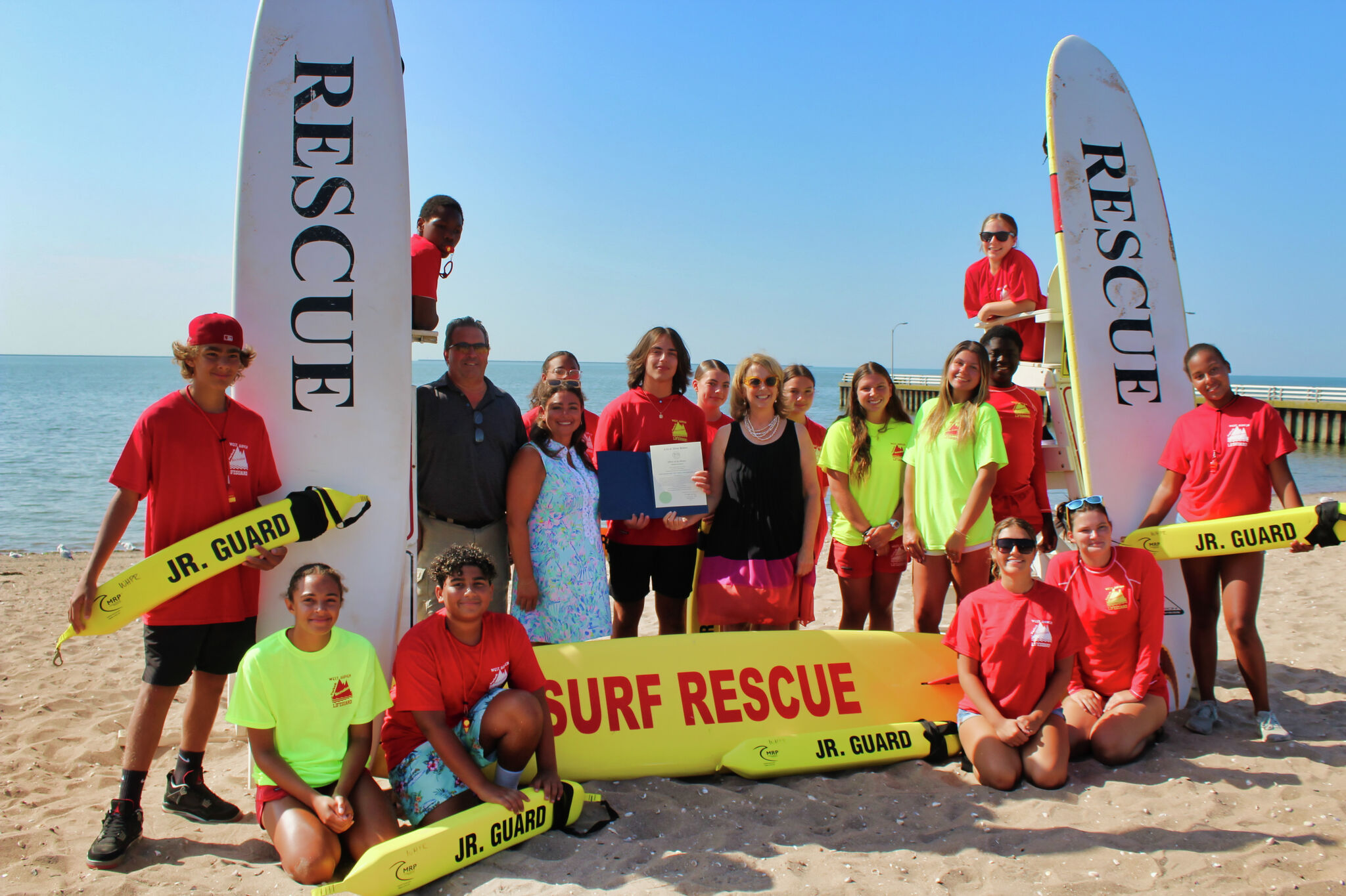 West Haven lifeguard honored for rescuing swimmer caught by current