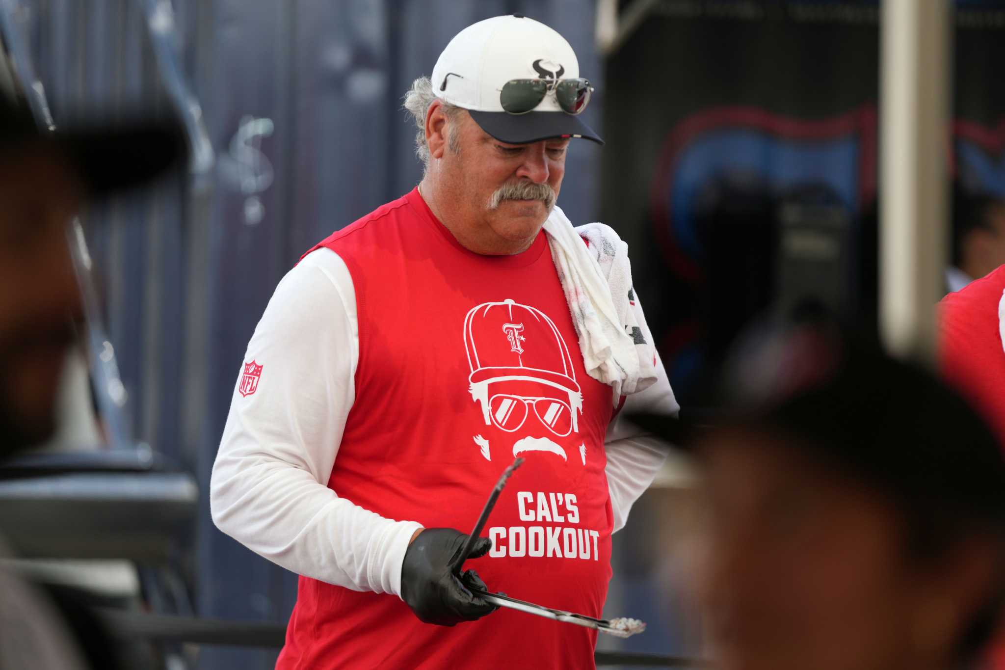 Houston Texans owner Cal McNair mans the grill for 'Cal's Cookout'