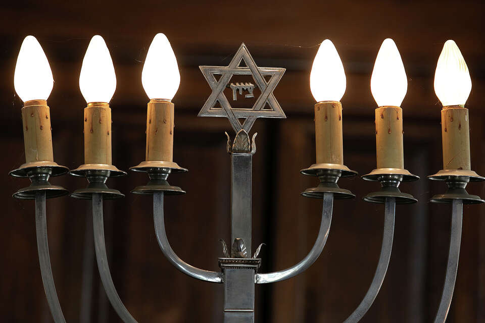 Hanukkah menorah lightings, including gelt drops from firetrucks
