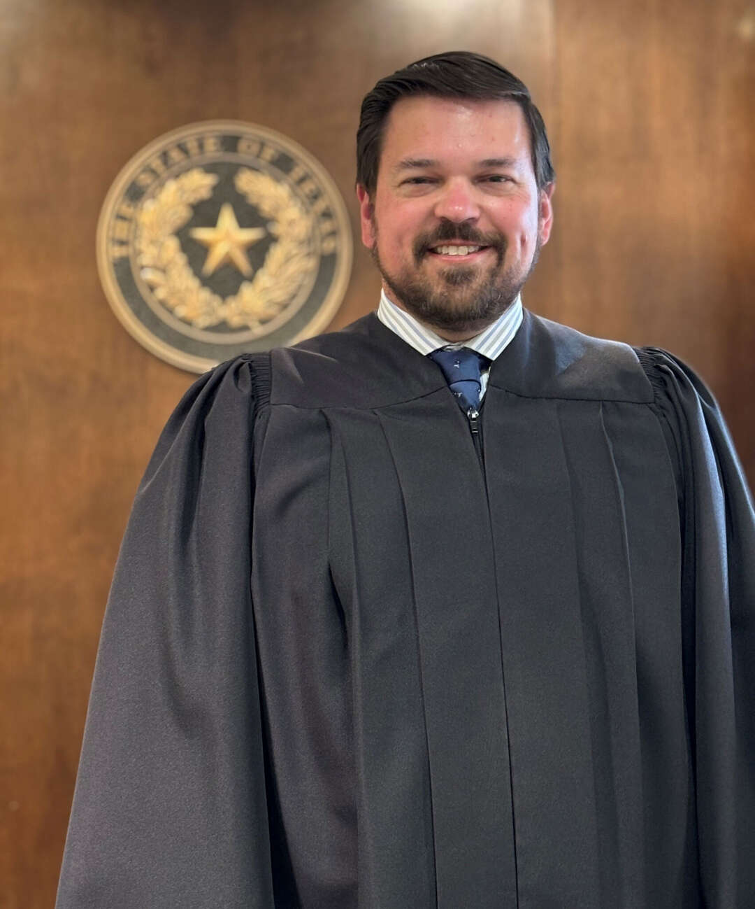 Brent Morgan sworn in to 318th Family District Court