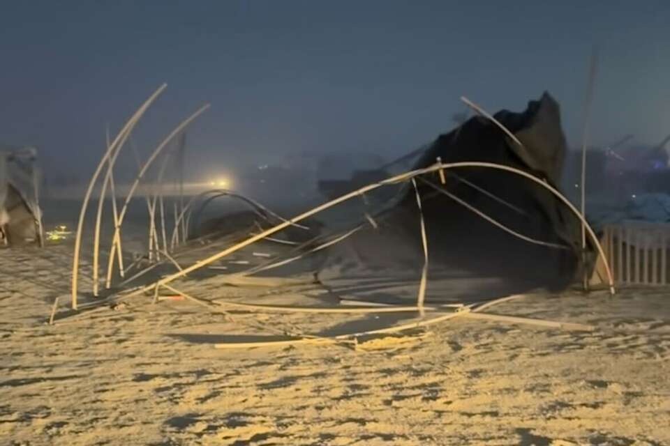 Burning Man dust storm flips tents, installations — flood risk warned