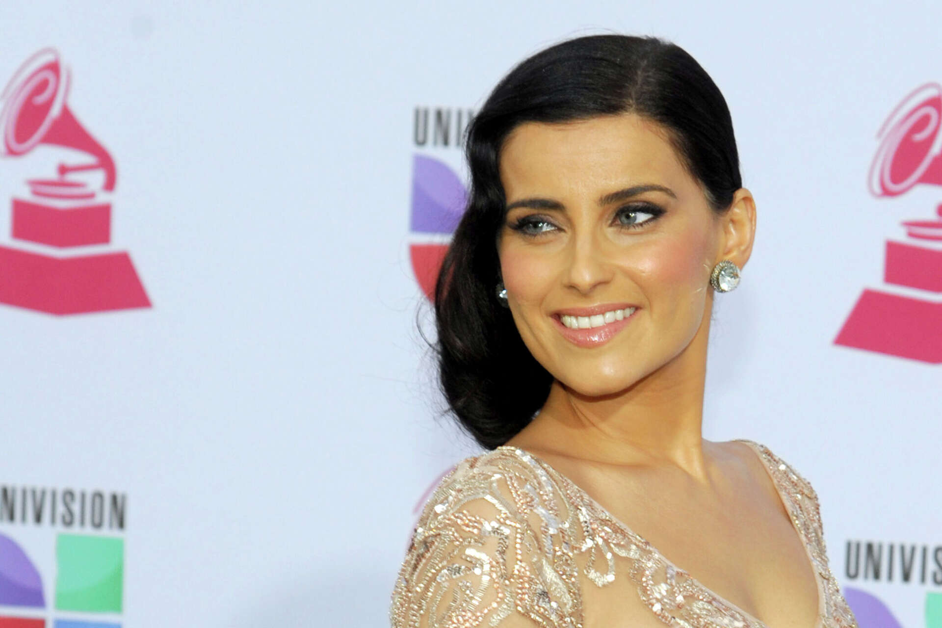 Nelly Furtado bites back at beauty standards with bold fashion choice