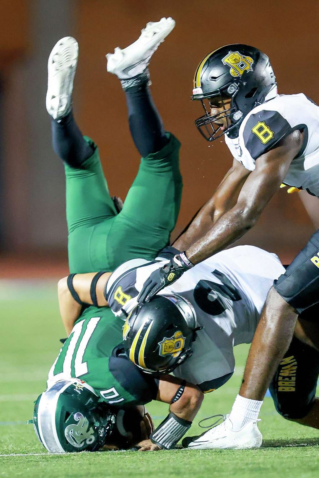 Brennan football earns close win over Reagan to open season
