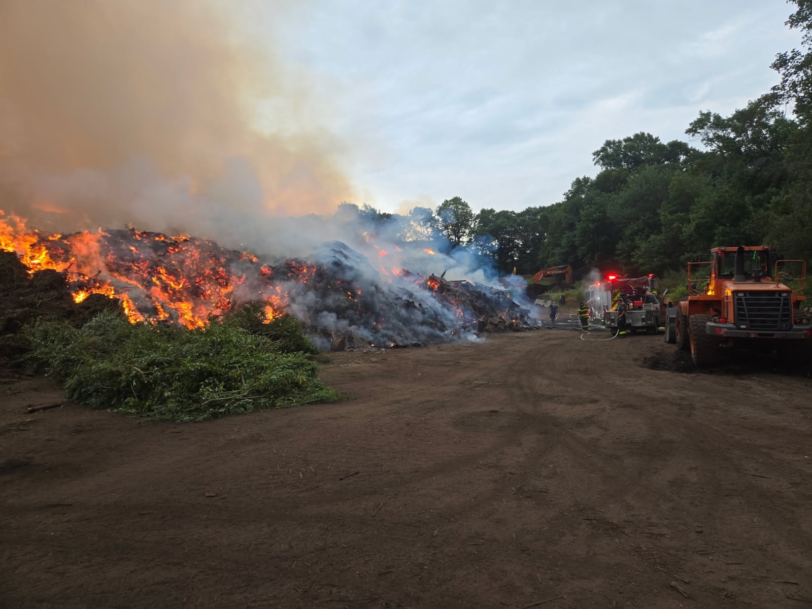 Clinton firefighters, state officials monitoring large brush fire