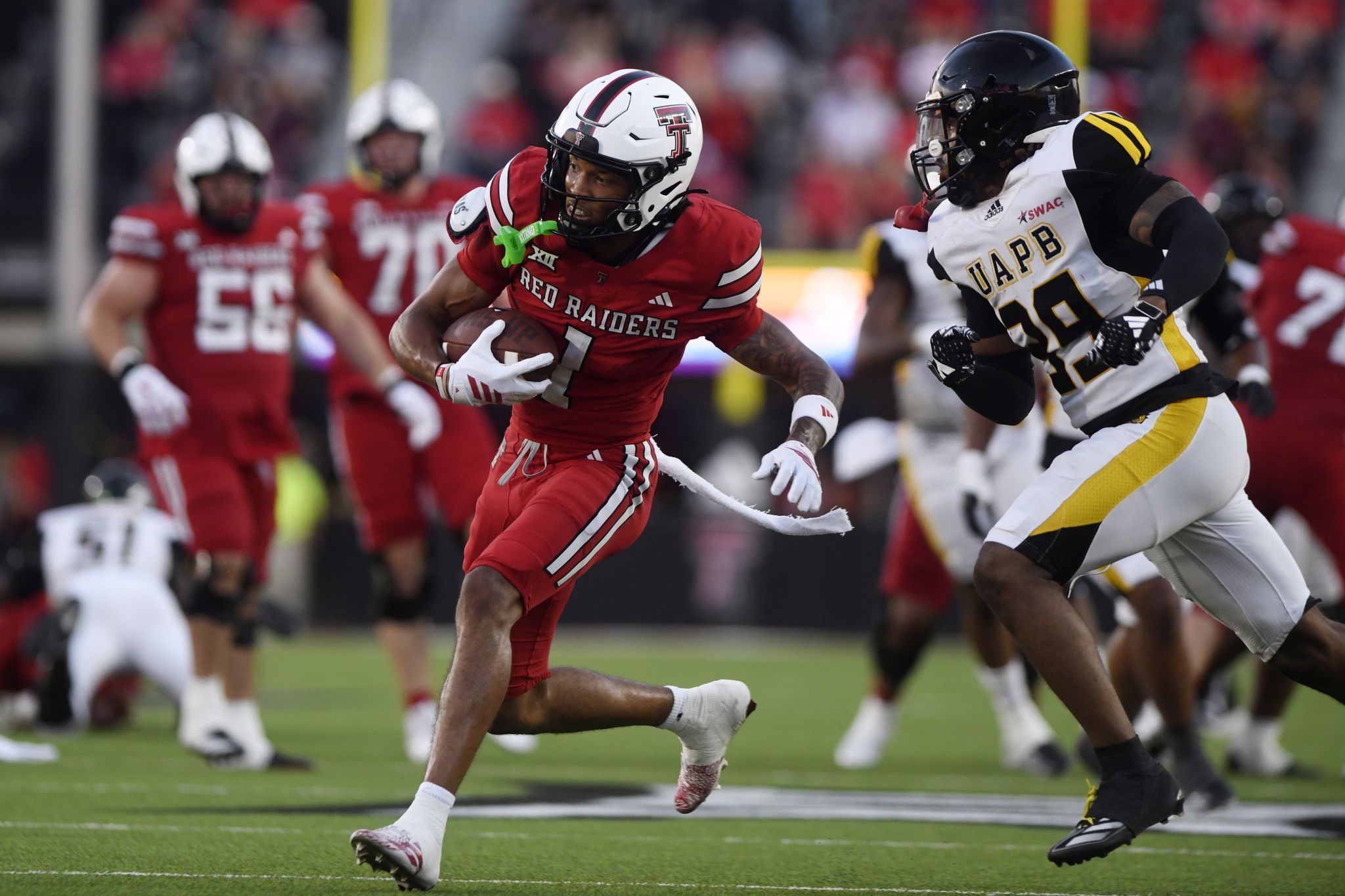 No. 23 Texas Tech routs Arkansas-Pine Bluff 67-7 as Behren Morton exits after sack