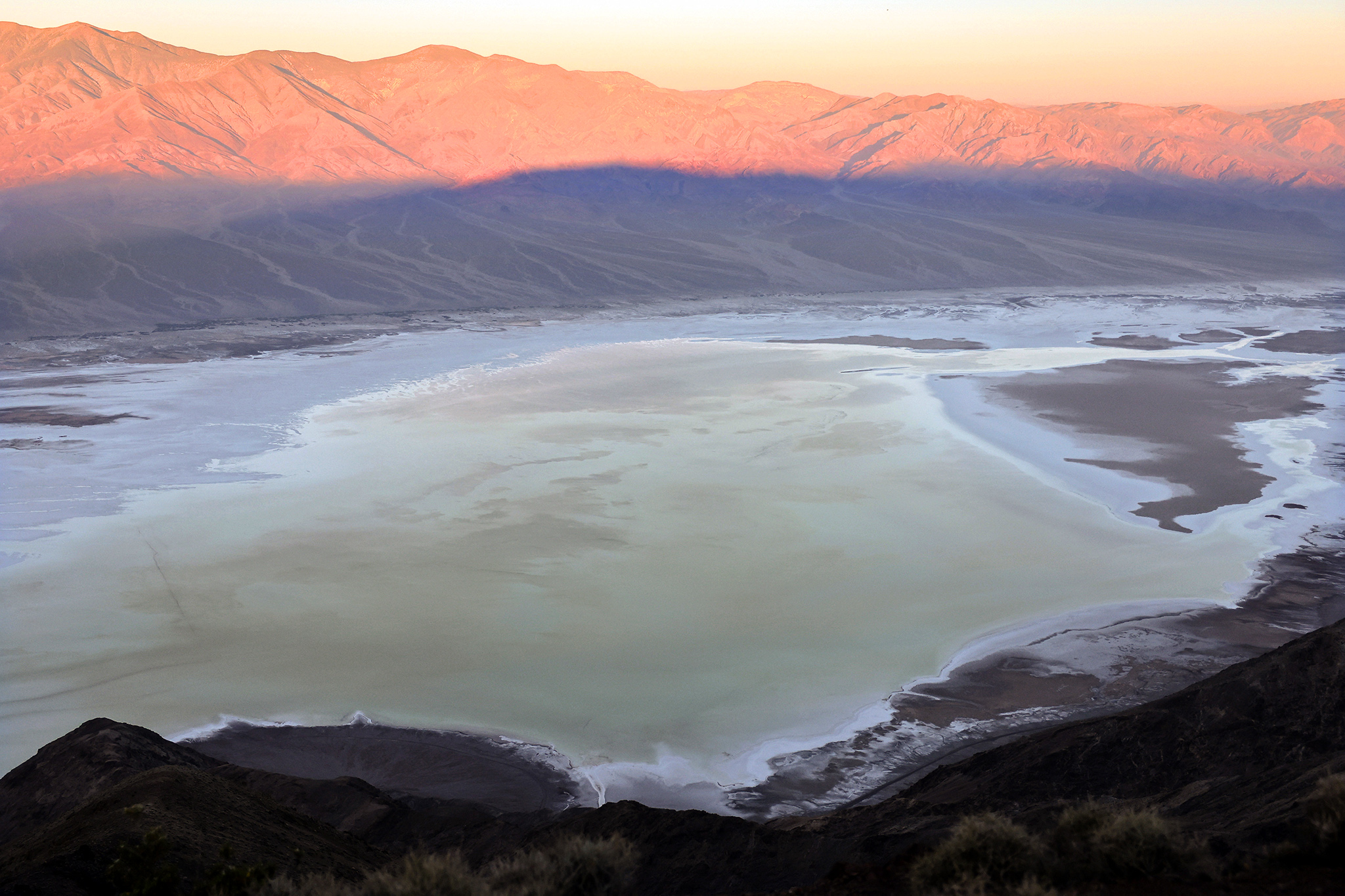 Death Valley under flash flood watch as triple-digit heat