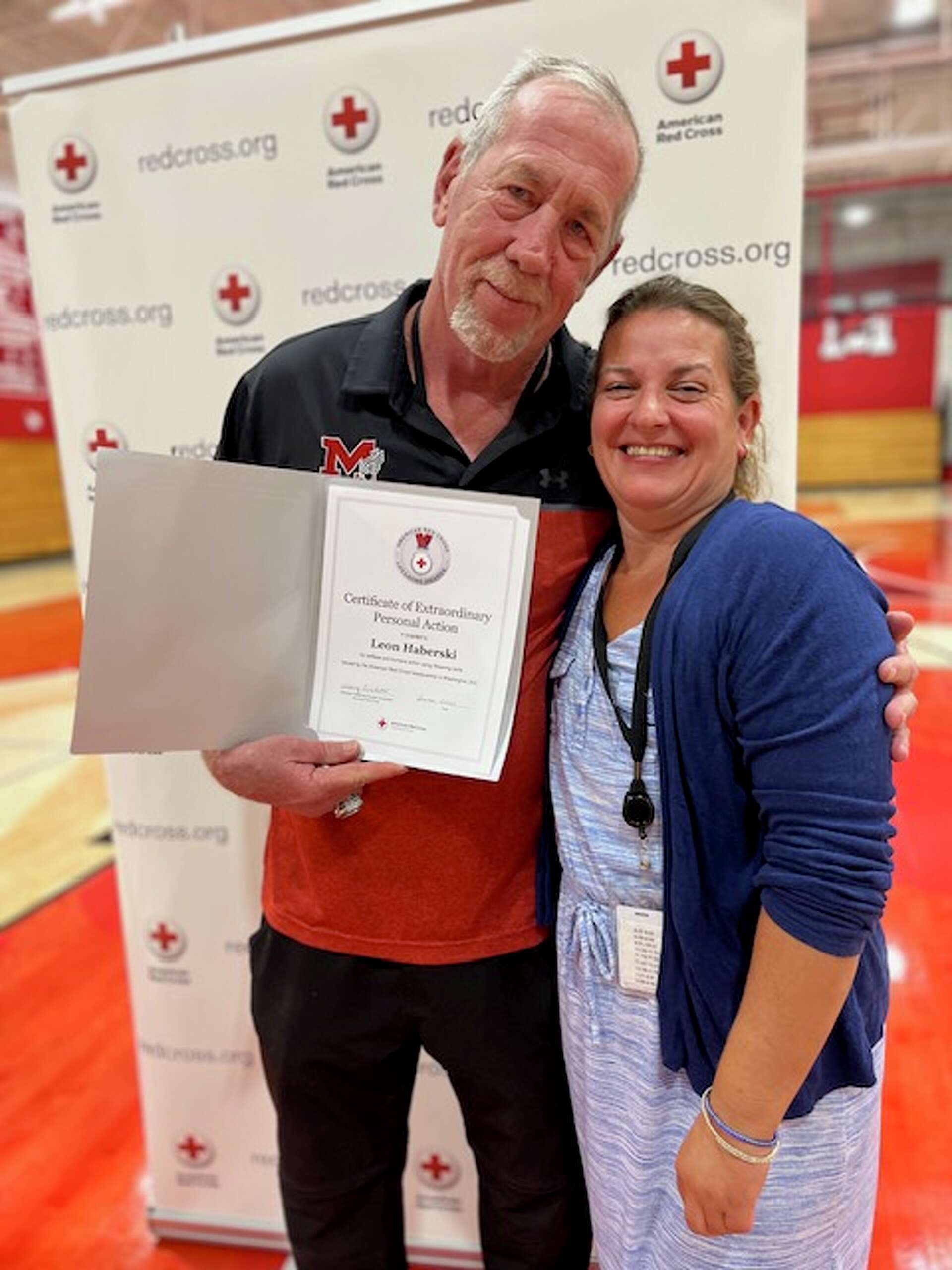 Manchester school security guard honored for saving choking students