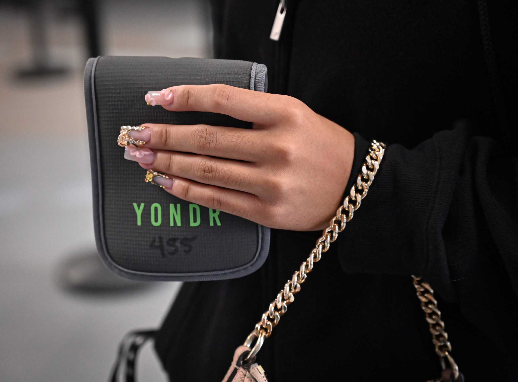 Long lines, theft and Yondr pouch woes as school phone ban begins