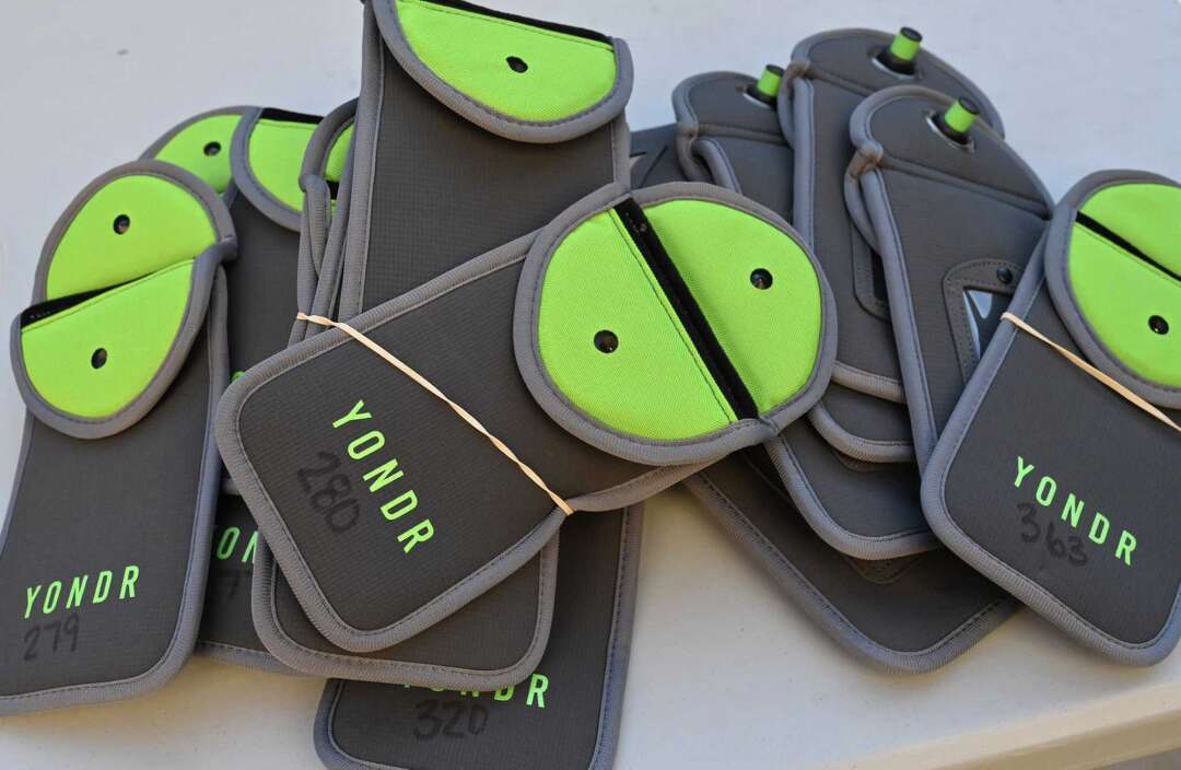 Long lines, theft and Yondr pouch woes as school phone ban begins