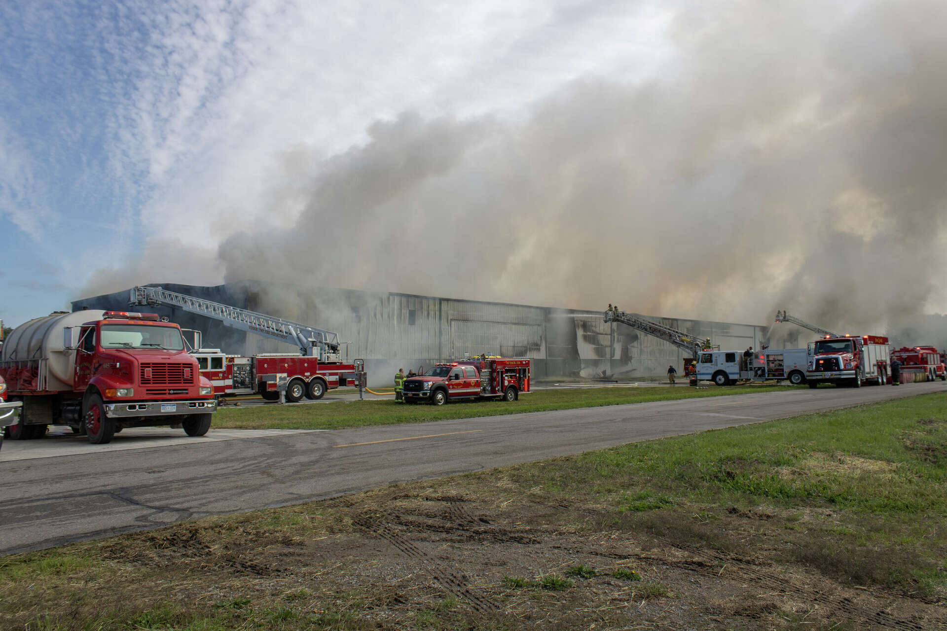 Bay Port hay barn fire will burn for weeks