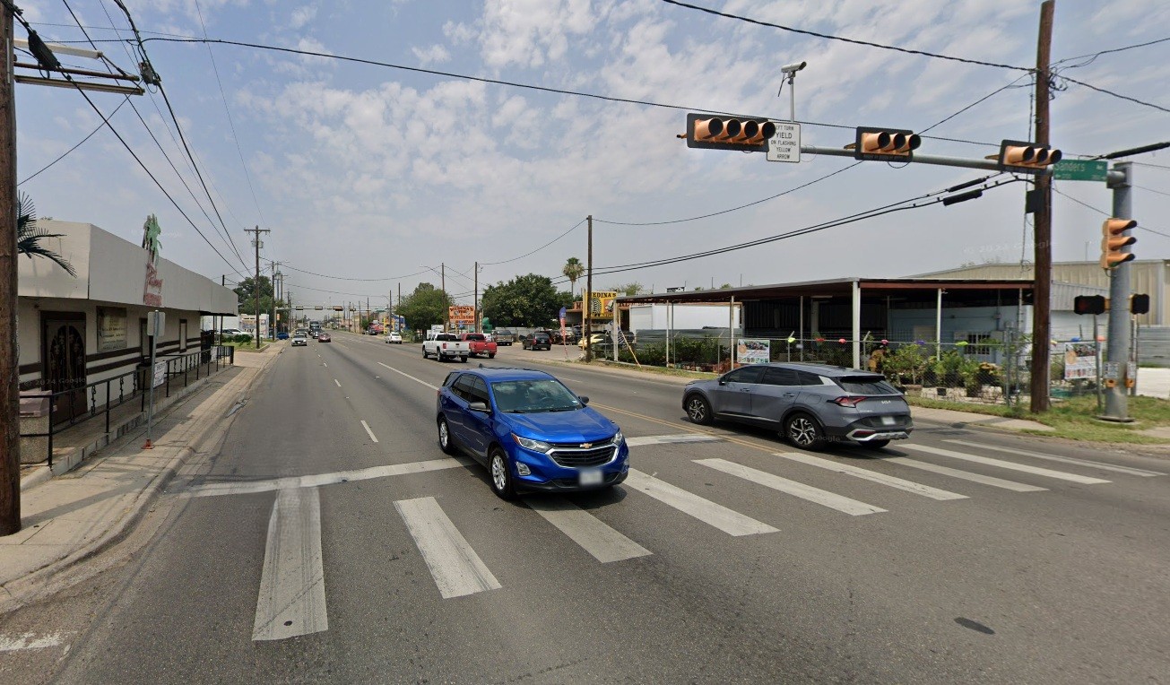 Two adults, child in critical condition after crash into pole