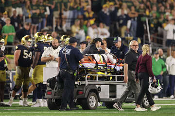 Texas A&M vs Notre Dame football: Bryce Anderson carted off the field