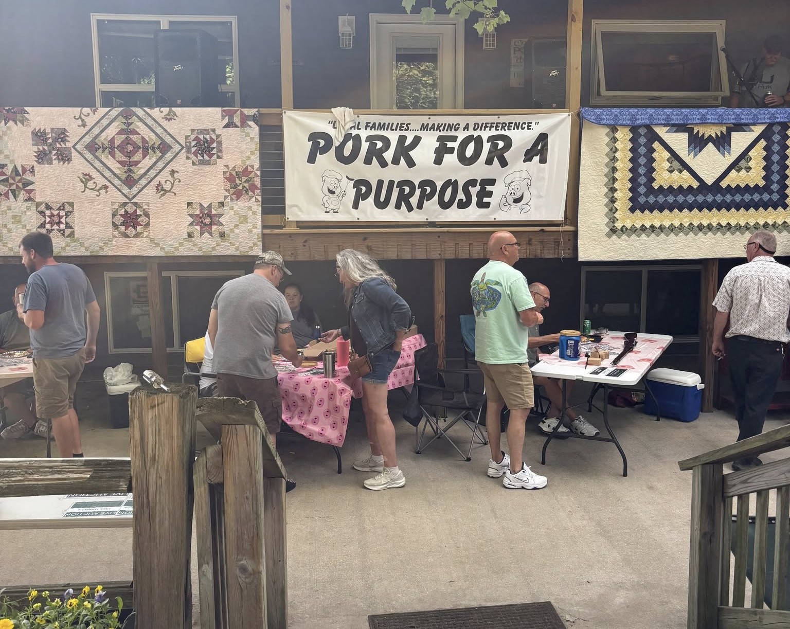 Two families benefiting from $41,000 raised during Pork for a Purpose