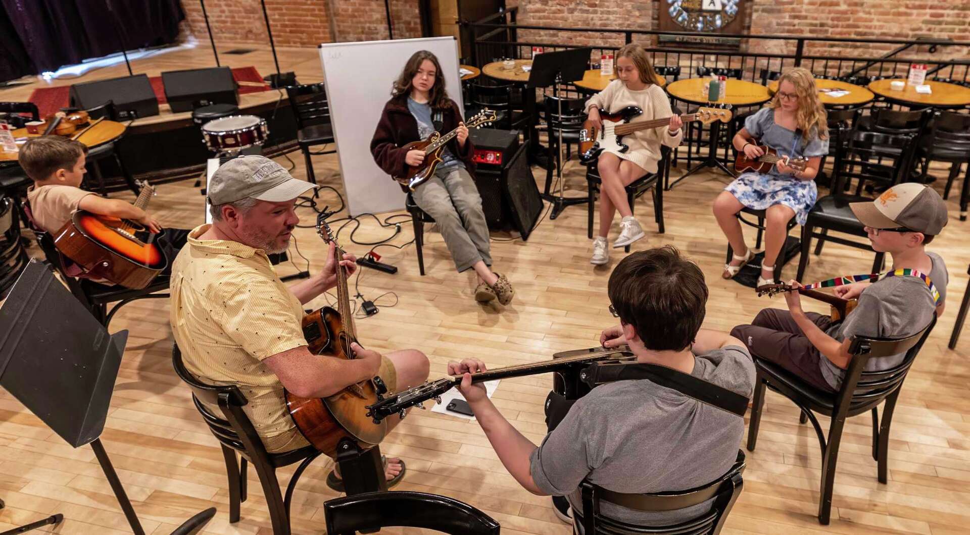 Caffe Lena's music school builds serious bands with kid musicians