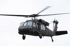 Military helicopters flying over Houston as part of training