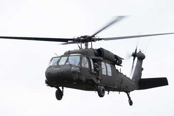 Military helicopters flying over Houston as part of training