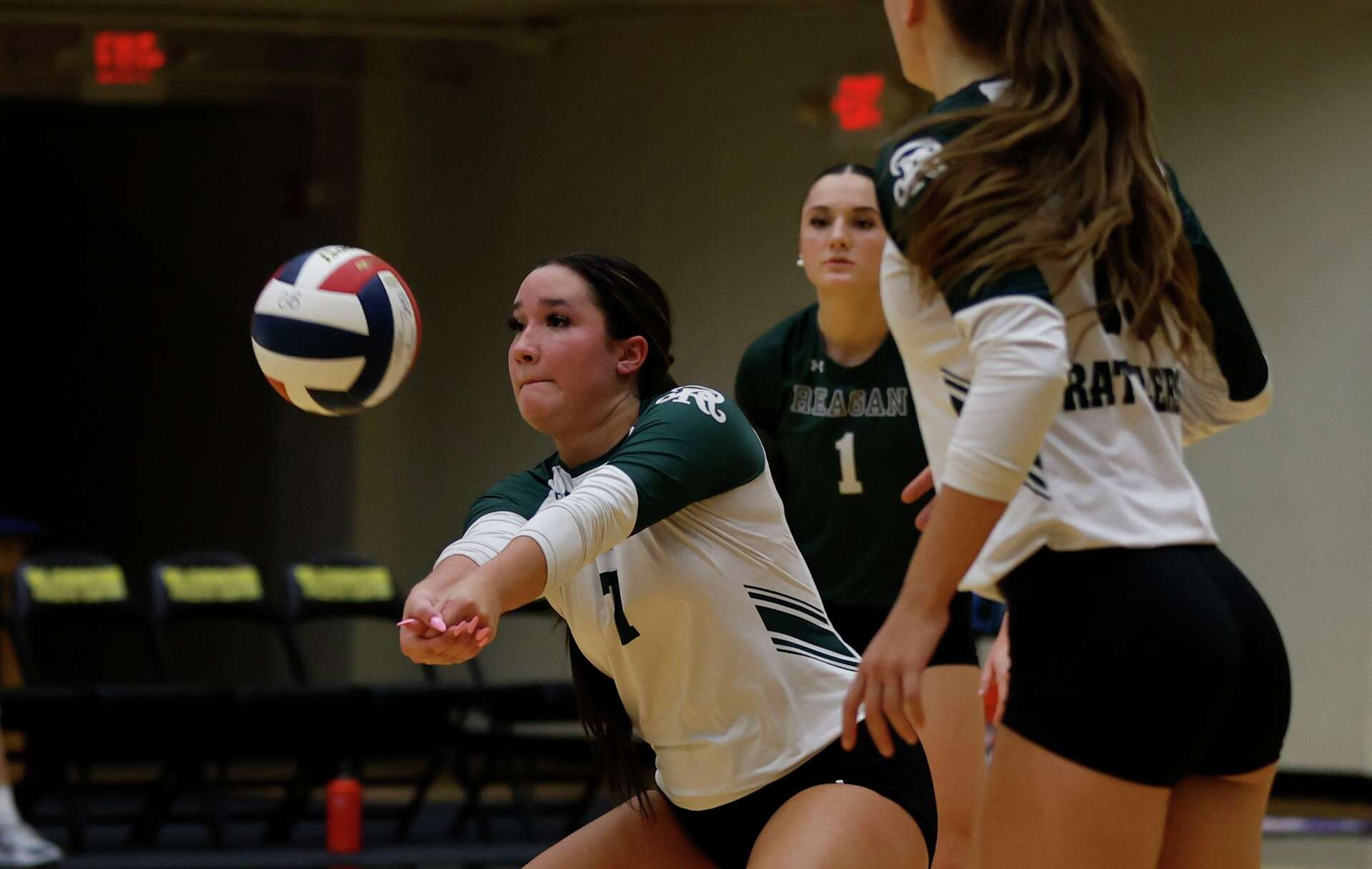Reagan volleyball grinds out four-set victory against rival Johnson