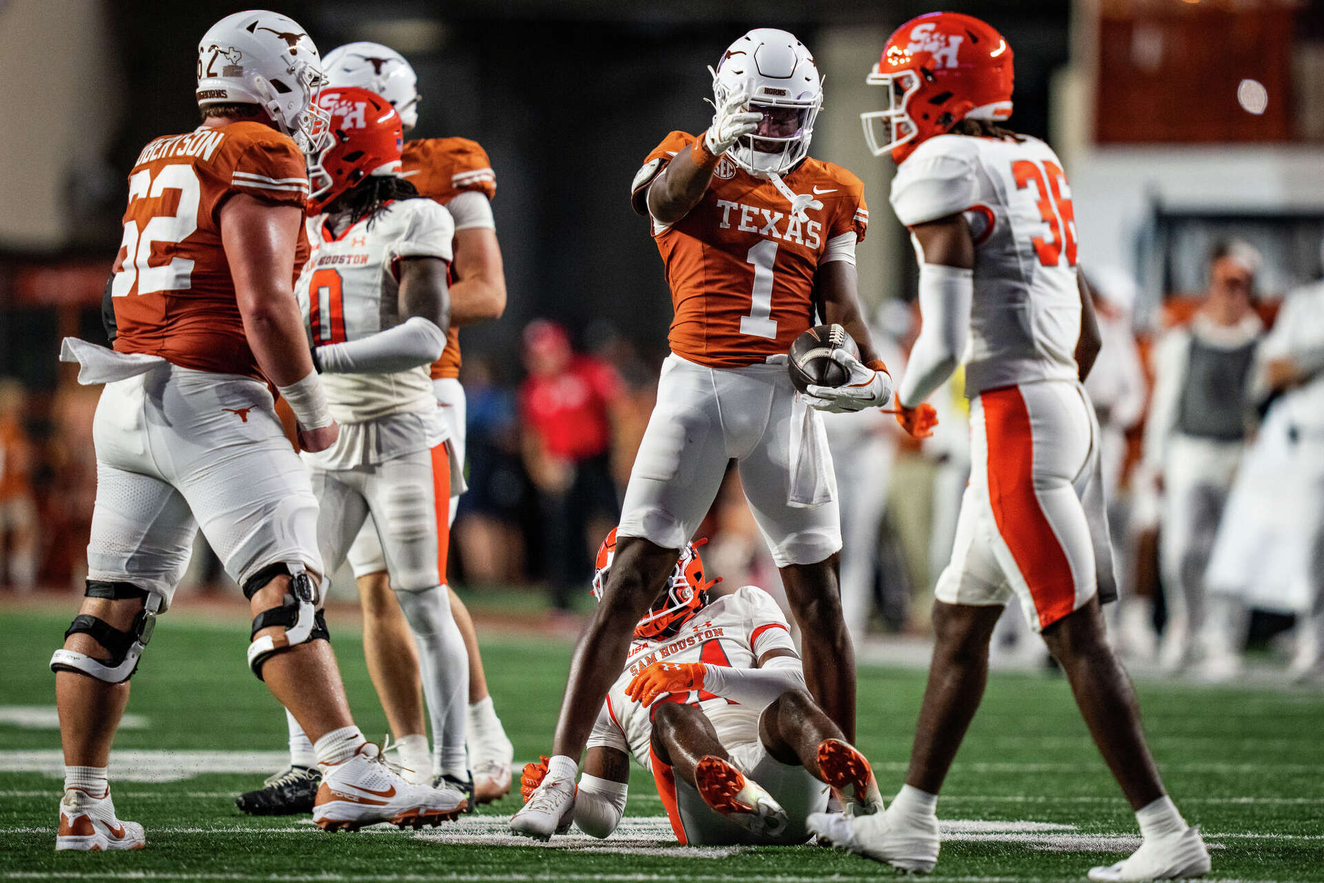 Texas Longhorns' offense routs Sam Houston. SEC up next