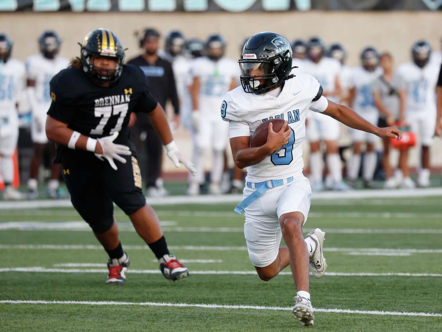 Harlan football takes control of 28-6A with win over Brennan