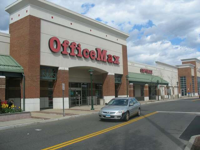 Atlas Holdings to buy parent of Office Depot, OfficeMax